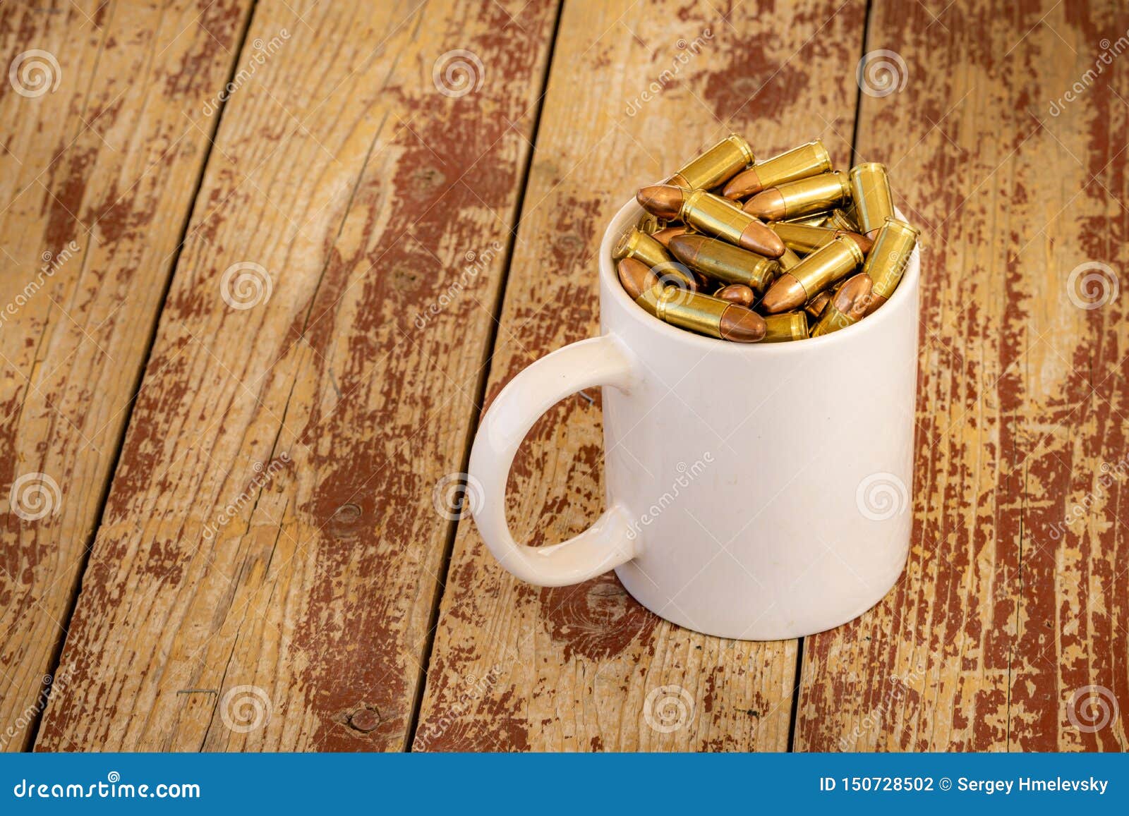 Cup of Bullets on a Wooden Table Stock Photo - Image of firearm ...