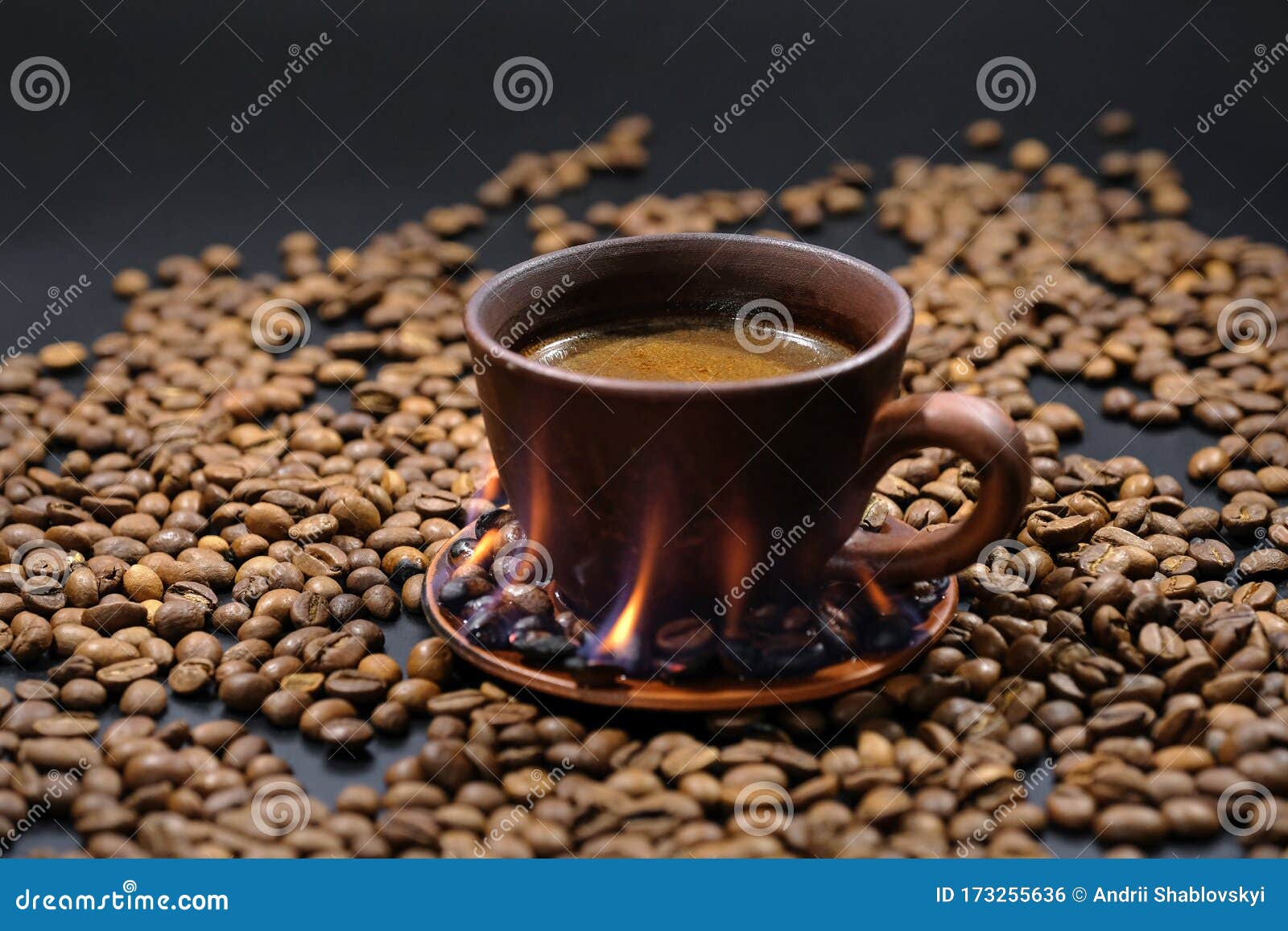 A Cup of Burning Coffee on Roasted Coffee Beans Stock Photo - Image of ...