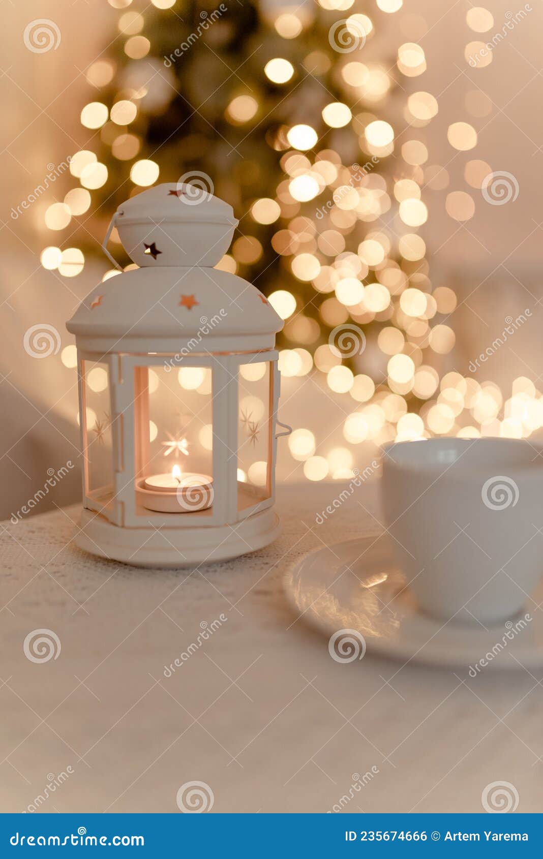 Cup and Candlestick on the Table in a Cozy Room with a Christmas Tree ...