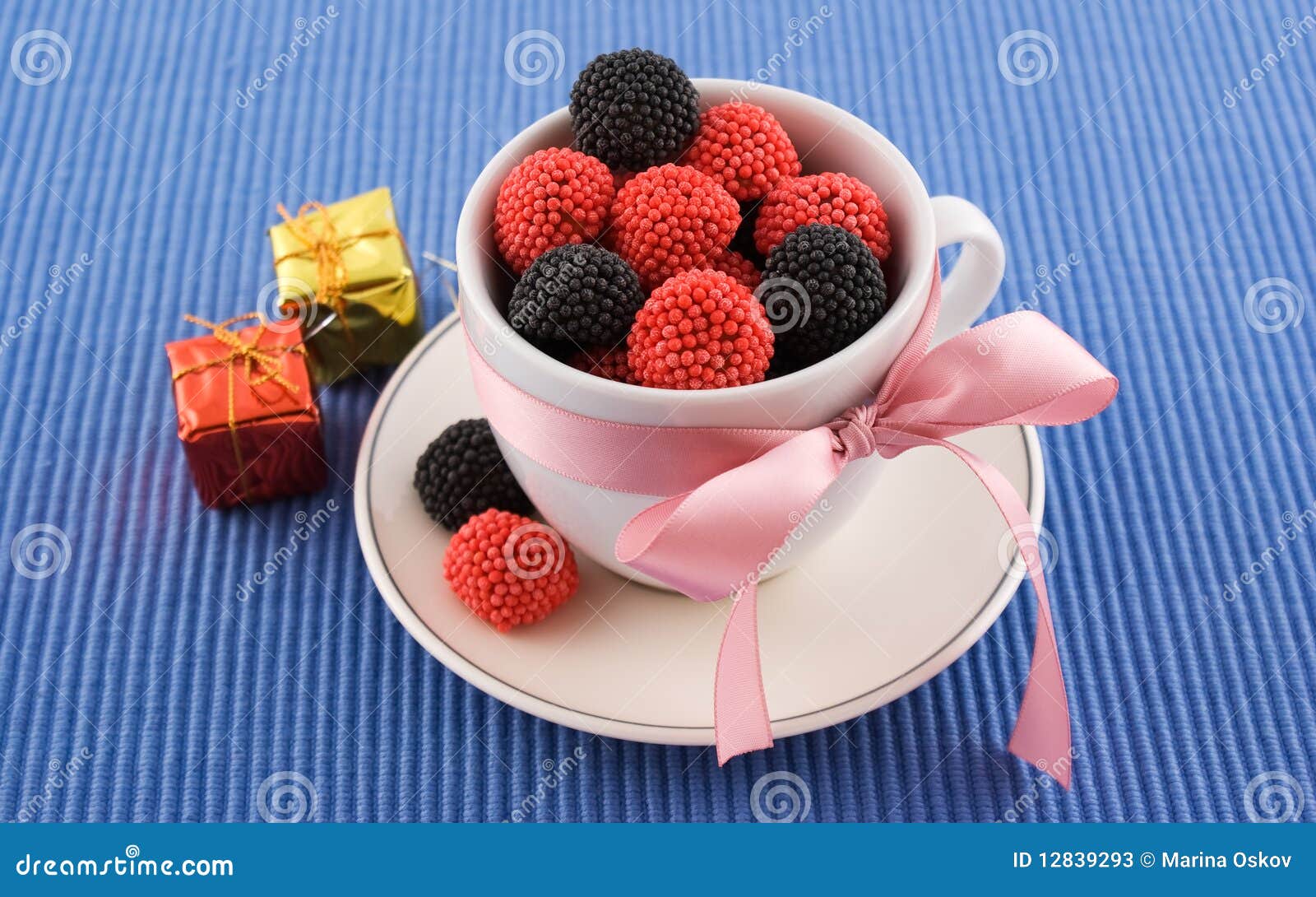 The Cup with Candy and Pink Bow Stock Image - Image of candy, gift ...