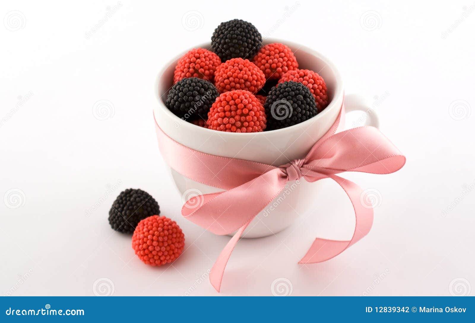 The Cup with Candy and Pink Bow Stock Photo - Image of pink, melt: 12839342