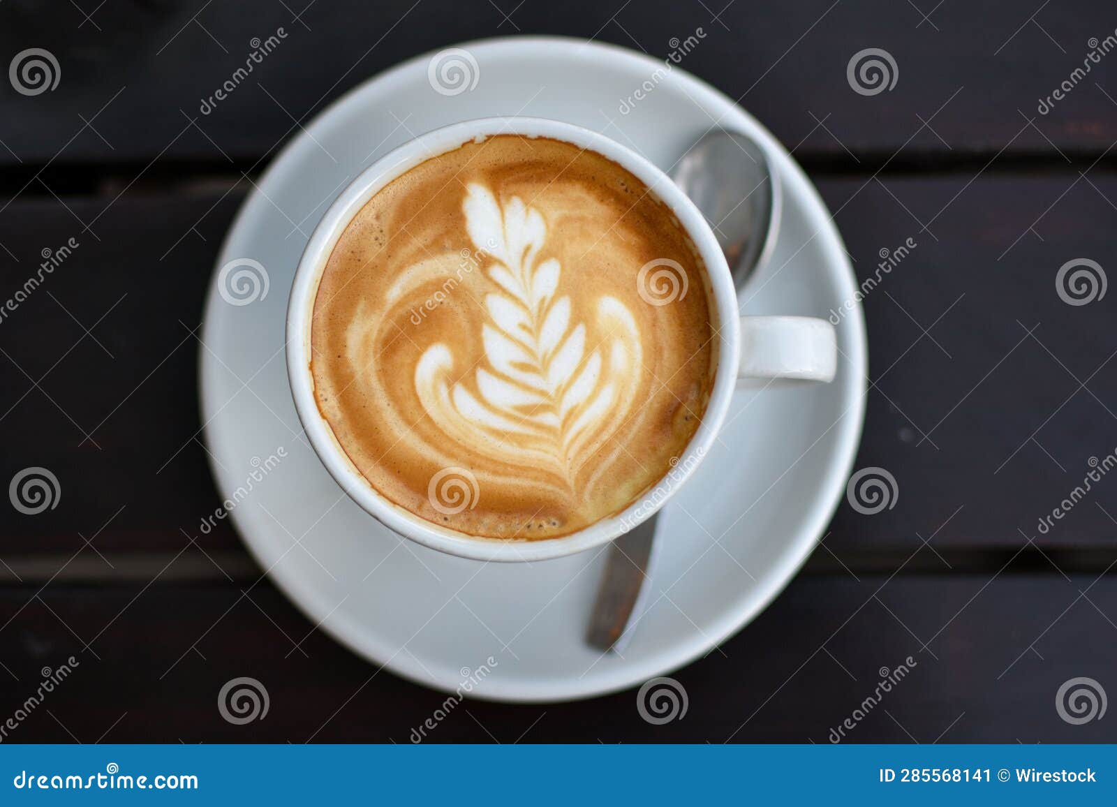Cup of Cappuccino Coffee with a Flower Design Stock Image - Image of ...