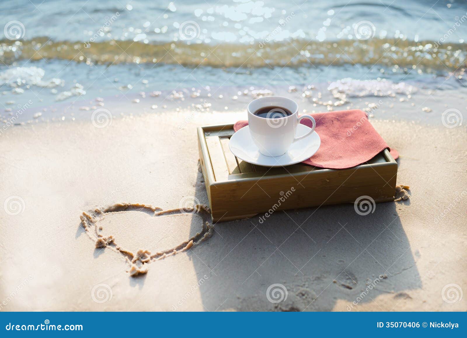 Cup of coffee at the beach stock photo. Image of breakfast - 35070406
