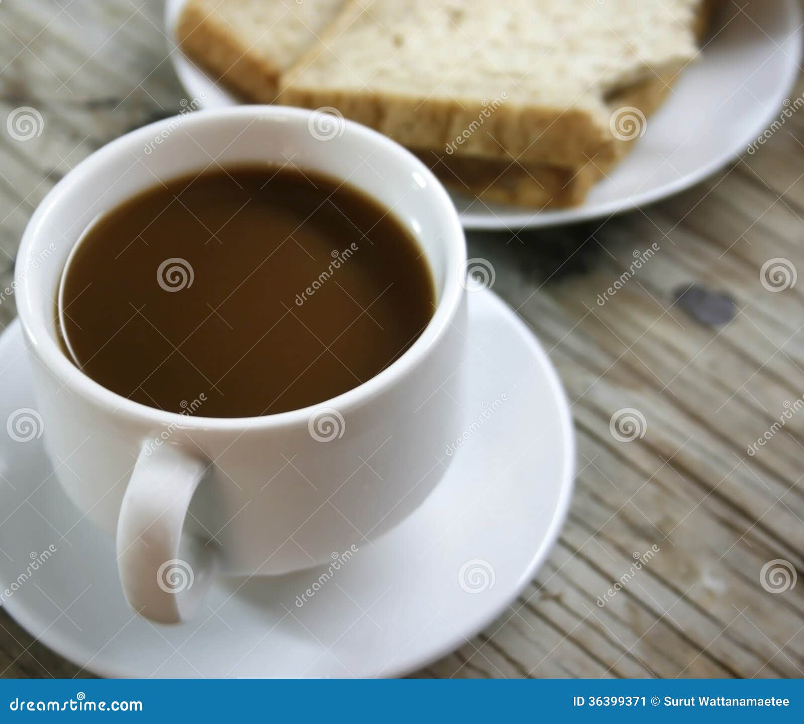 A cup of coffee and bread stock image. Image of roasted - 36399371