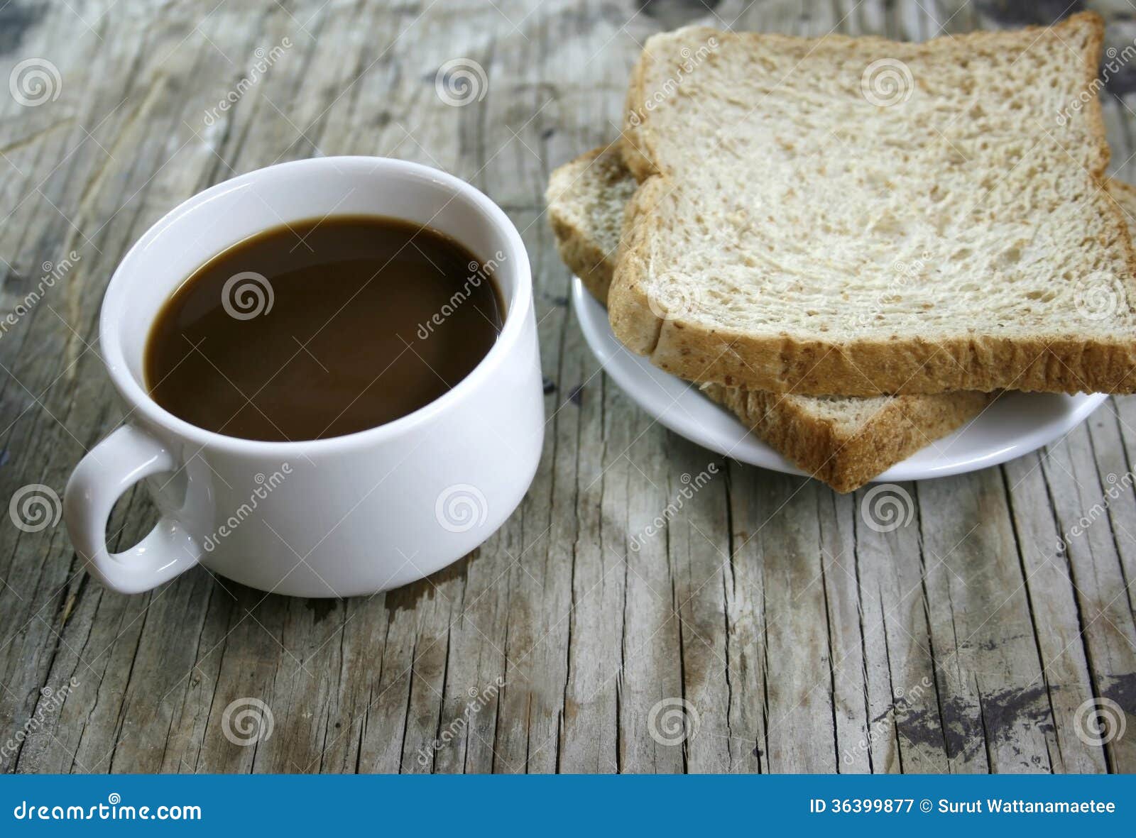 A cup of coffee and bread stock image. Image of drink - 36399877