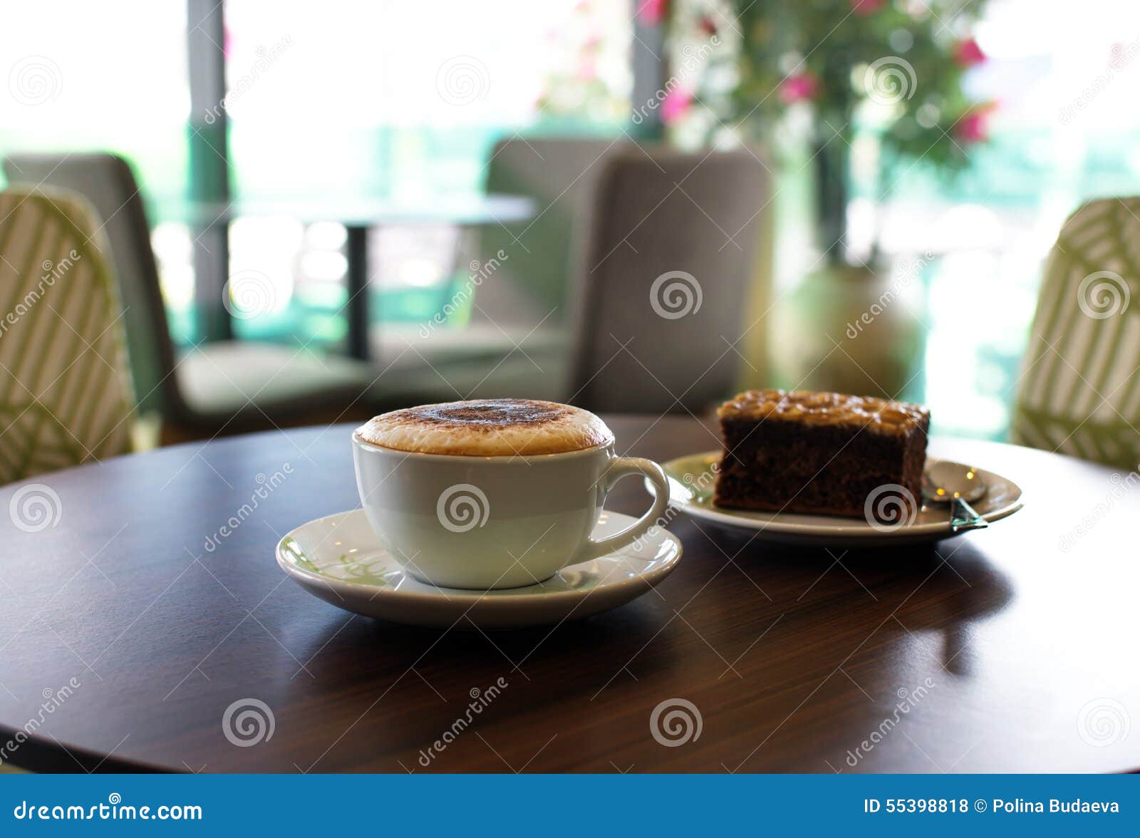 Cup of Coffee and a Cake on the Table in Cafe Stock Photo - Image of ...