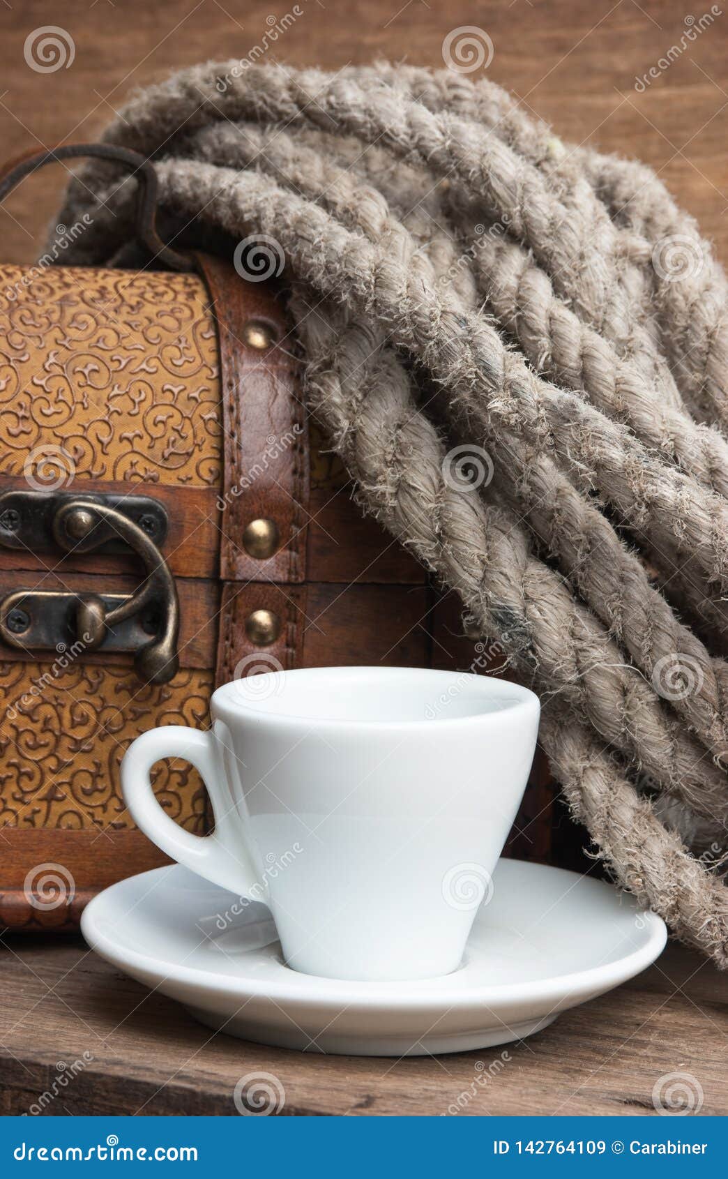 Cup of coffee and chest stock image. Image of scented - 142764109