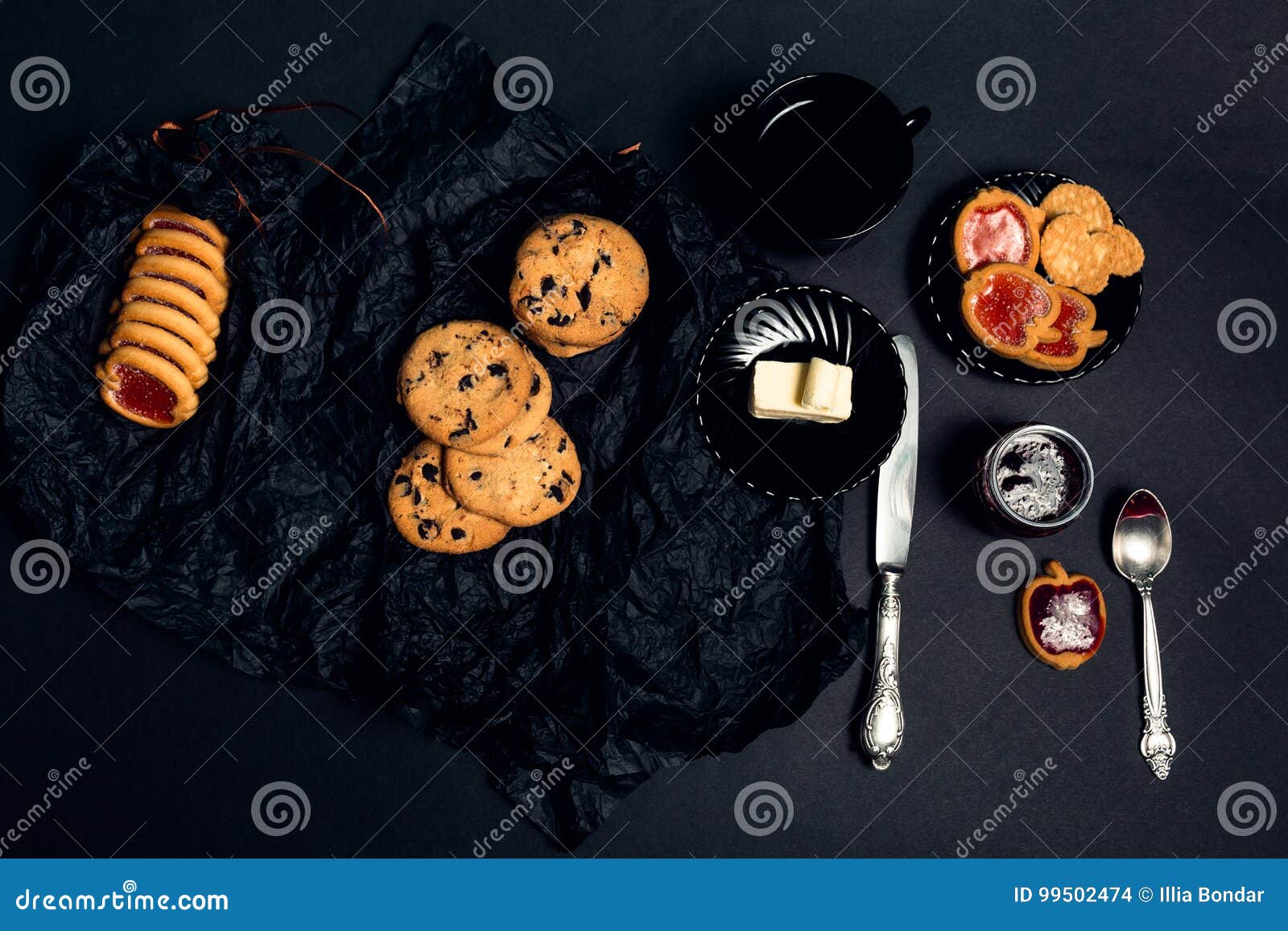 Cup of Coffee with Chocolate Cookies and Biscuits on Black Table ...