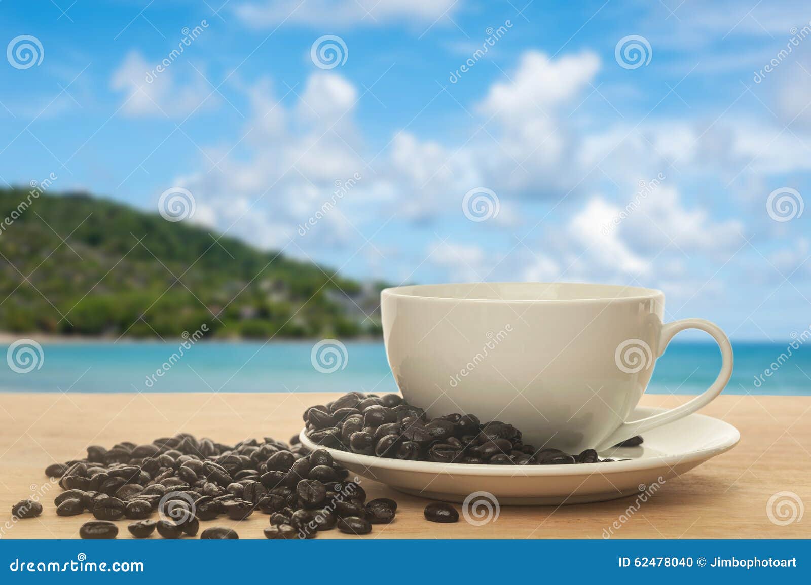 Cup of Coffee with Coffee Bean on the Beach Background Stock Photo ...