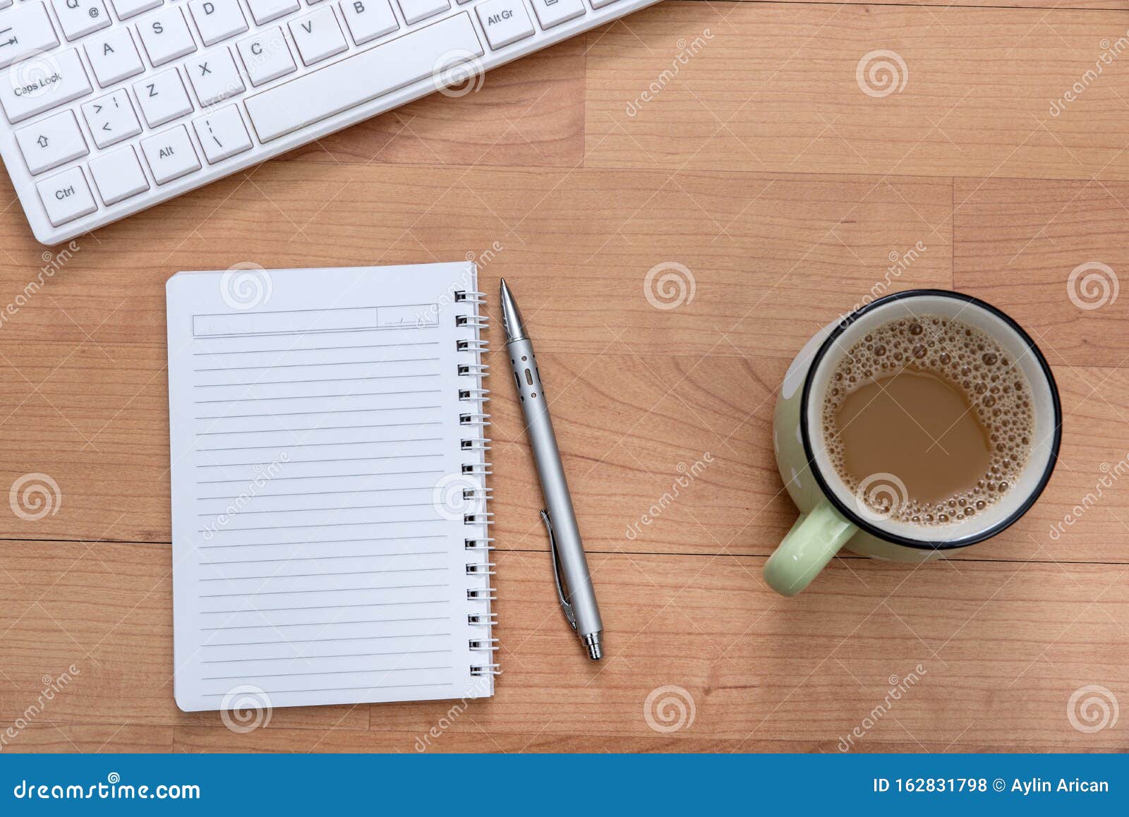 A Cup of Coffee, Computer Keyboard and Ring Binder on the Desk Stock ...