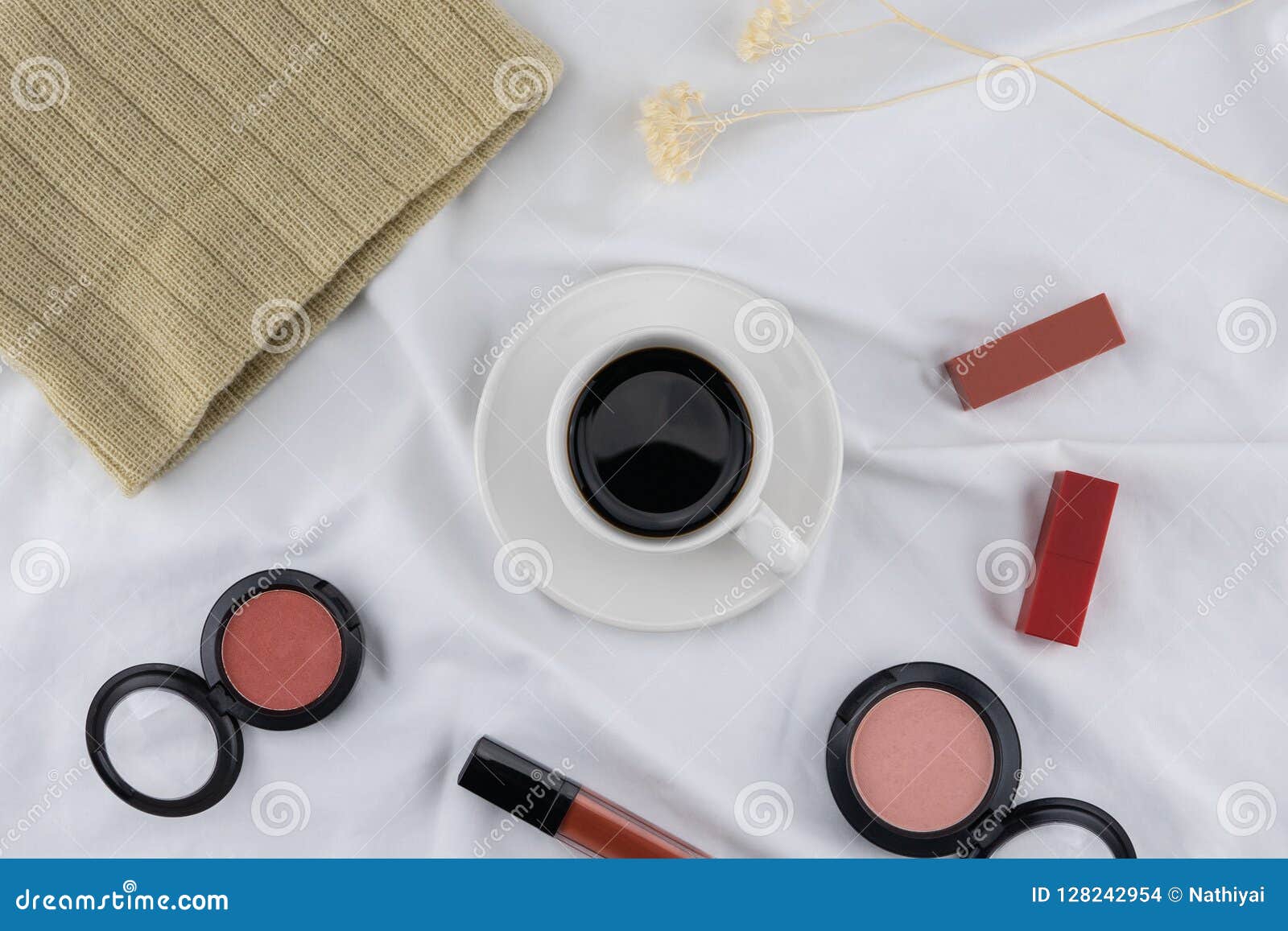 A Cup of Coffee with Cosmetics Stock Photo - Image of blush, gloss ...