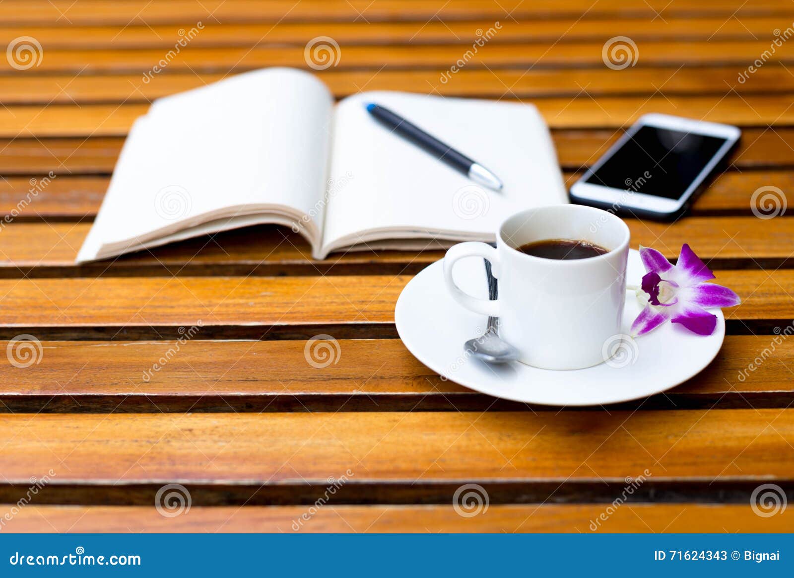 Cup of Coffee with Flower and Note Book on the Table Stock Image ...