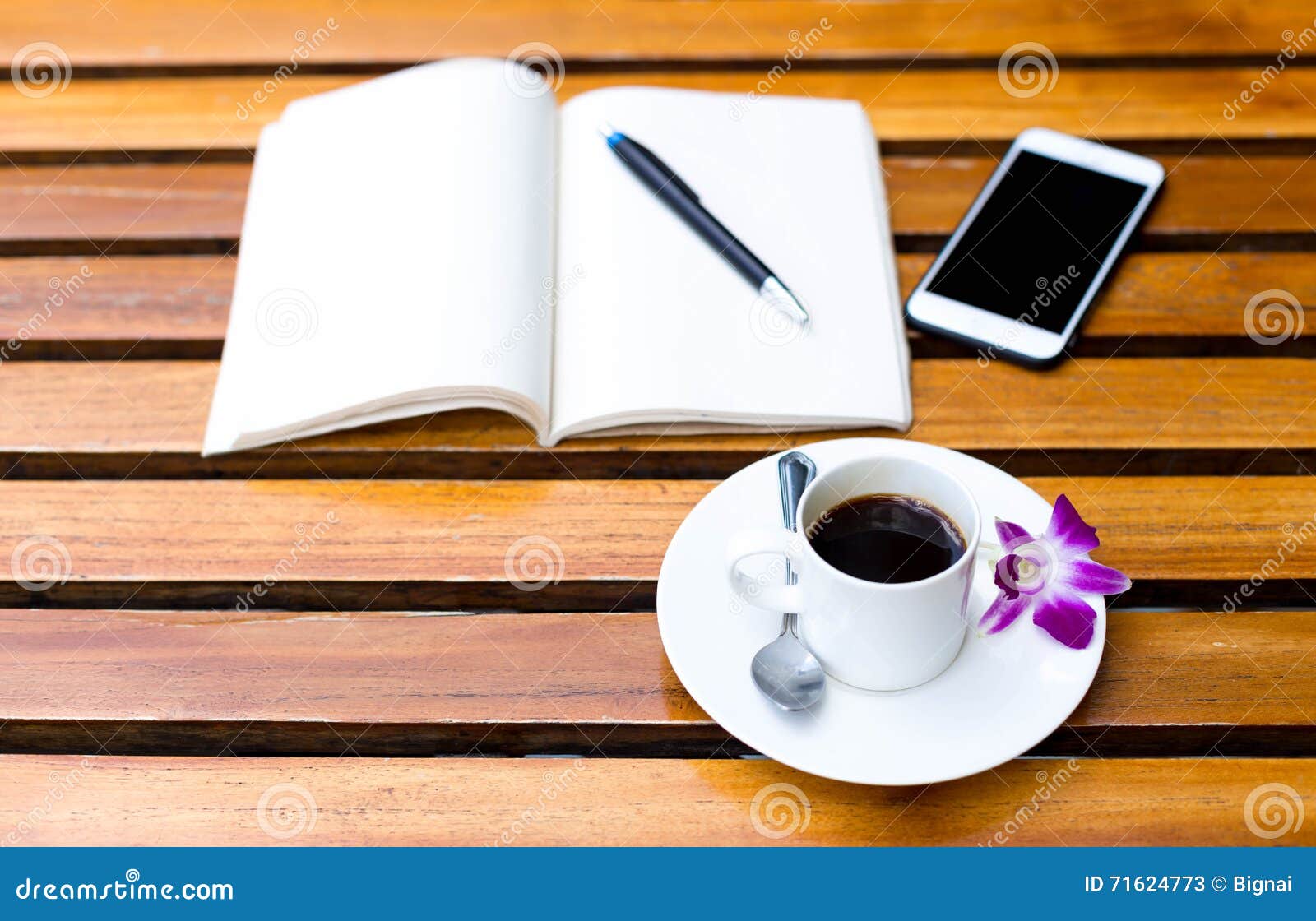 Cup of Coffee with Flower and Note Book on the Table Stock Image ...