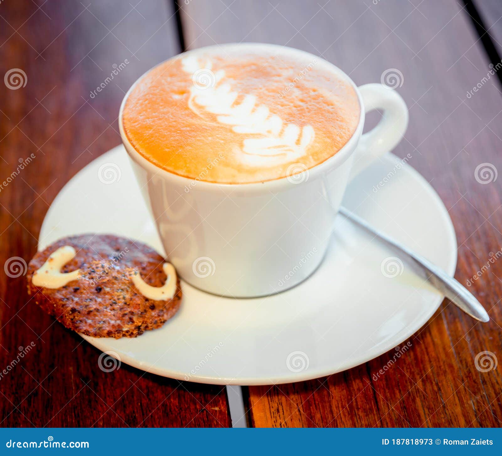 Cup of Coffee with Foam and Biscuits on the Table. Stock Image - Image ...