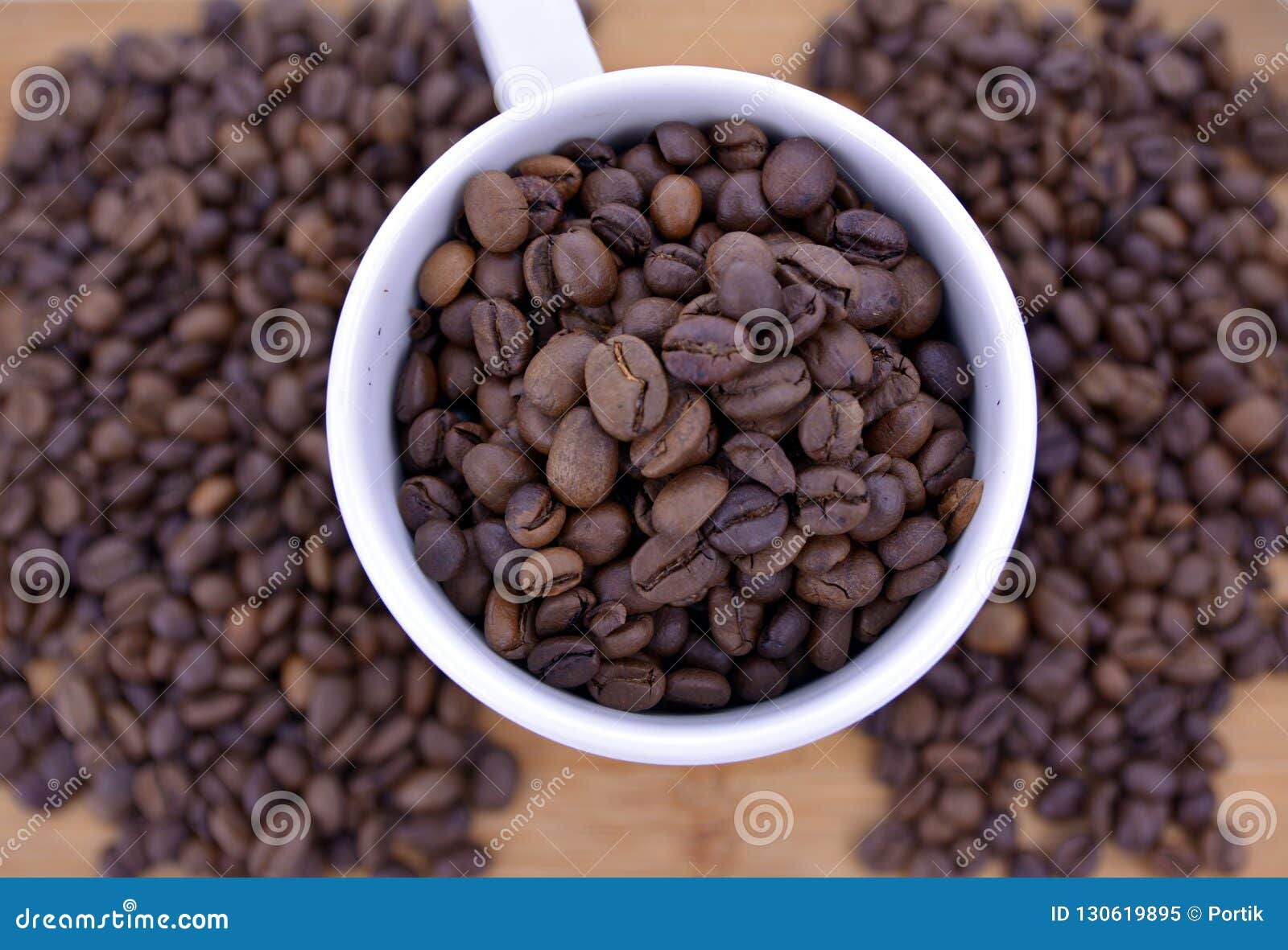 Cup of Coffee Full of Coffee Beans Stock Image - Image of brown, grain ...