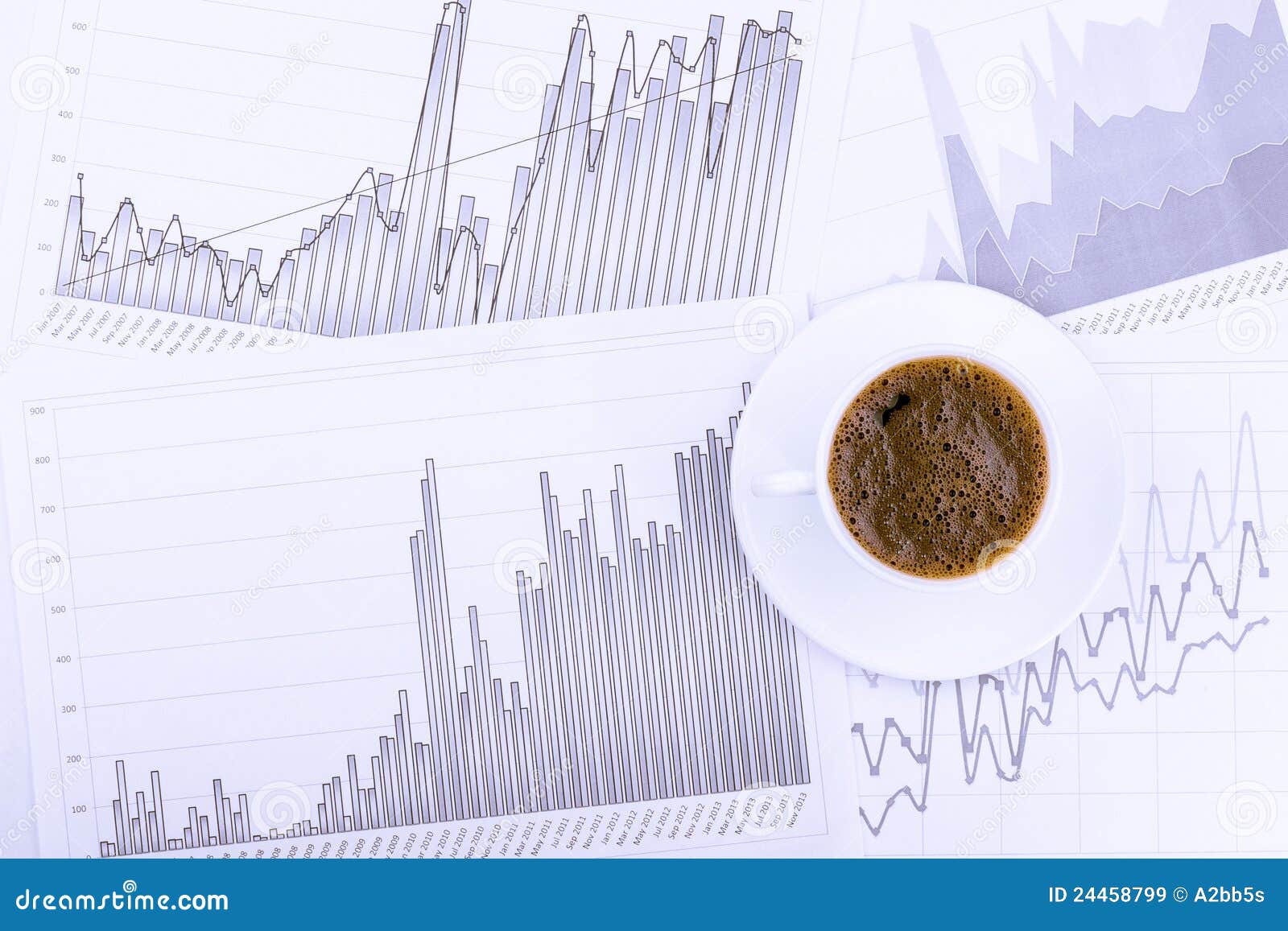 Cup of coffee and graphs stock image. Image of porcelain - 24458799