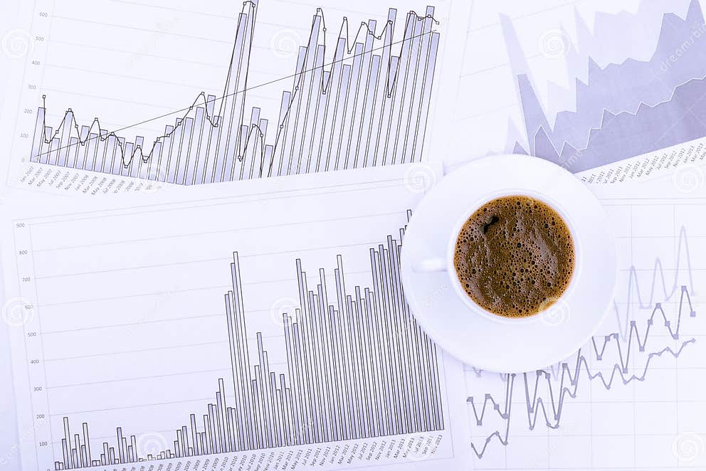Cup of coffee and graphs stock image. Image of porcelain - 24458799