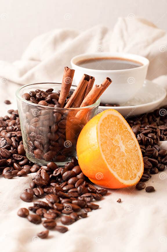 Cup of Coffee, Half an Orange and Coffee Beans Stock Photo - Image of ...