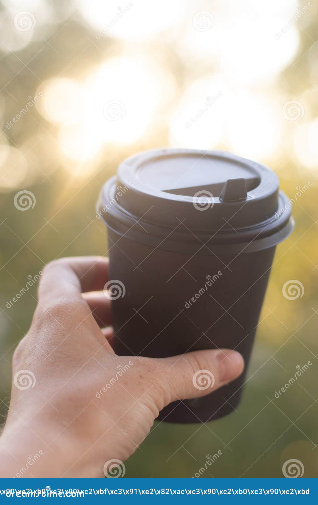 A Cup of Coffee in Hand. Coffee in Hand. Coffee in Nature Stock Image ...