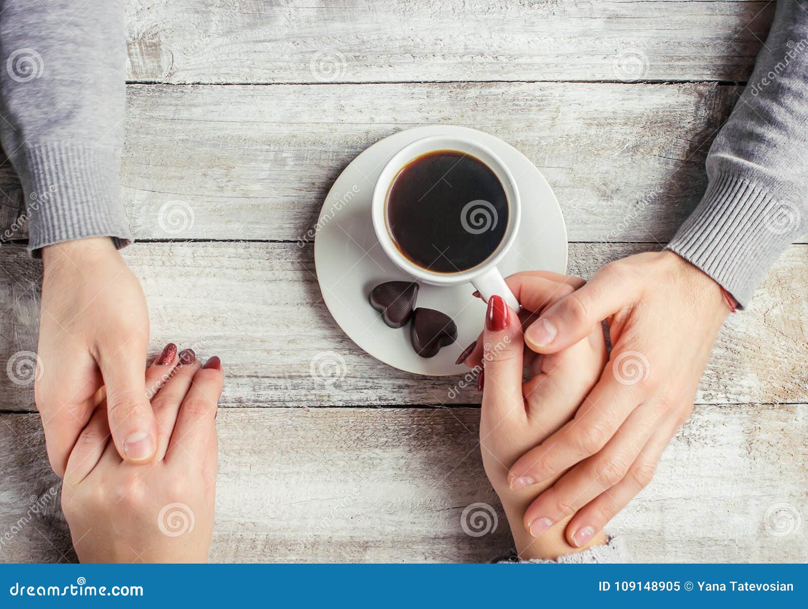 A Cup of Coffee in the Hands of Lovers. Silhouette in a Cup Stock Image ...