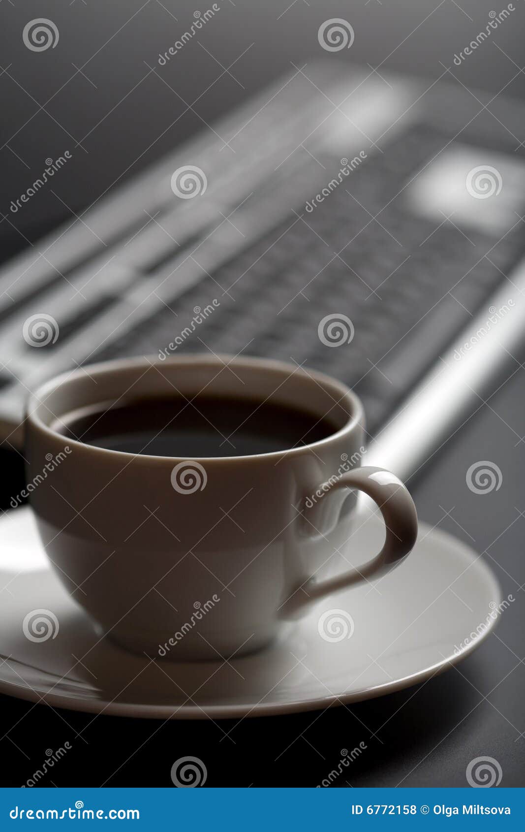 Cup of coffee and keyboard stock photo. Image of keyboard - 6772158