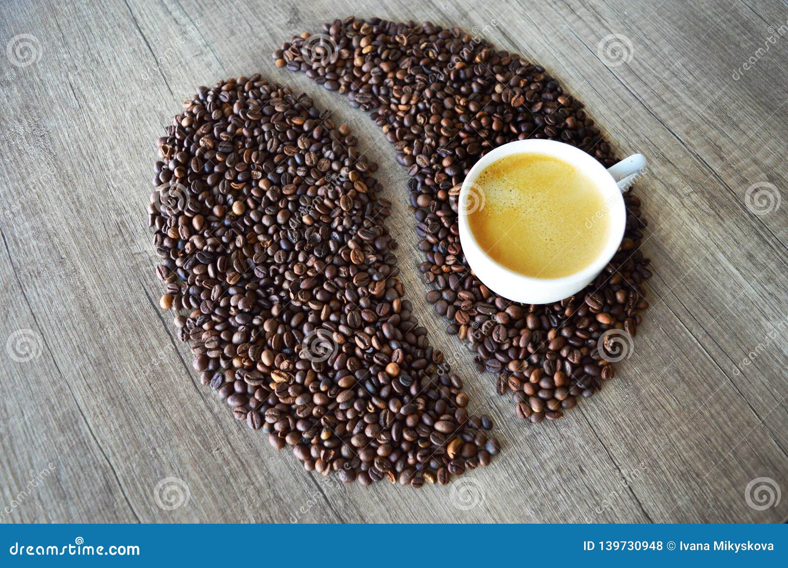 A Cup of Coffee on a Large Coffee Bean Stock Photo - Image of taste ...
