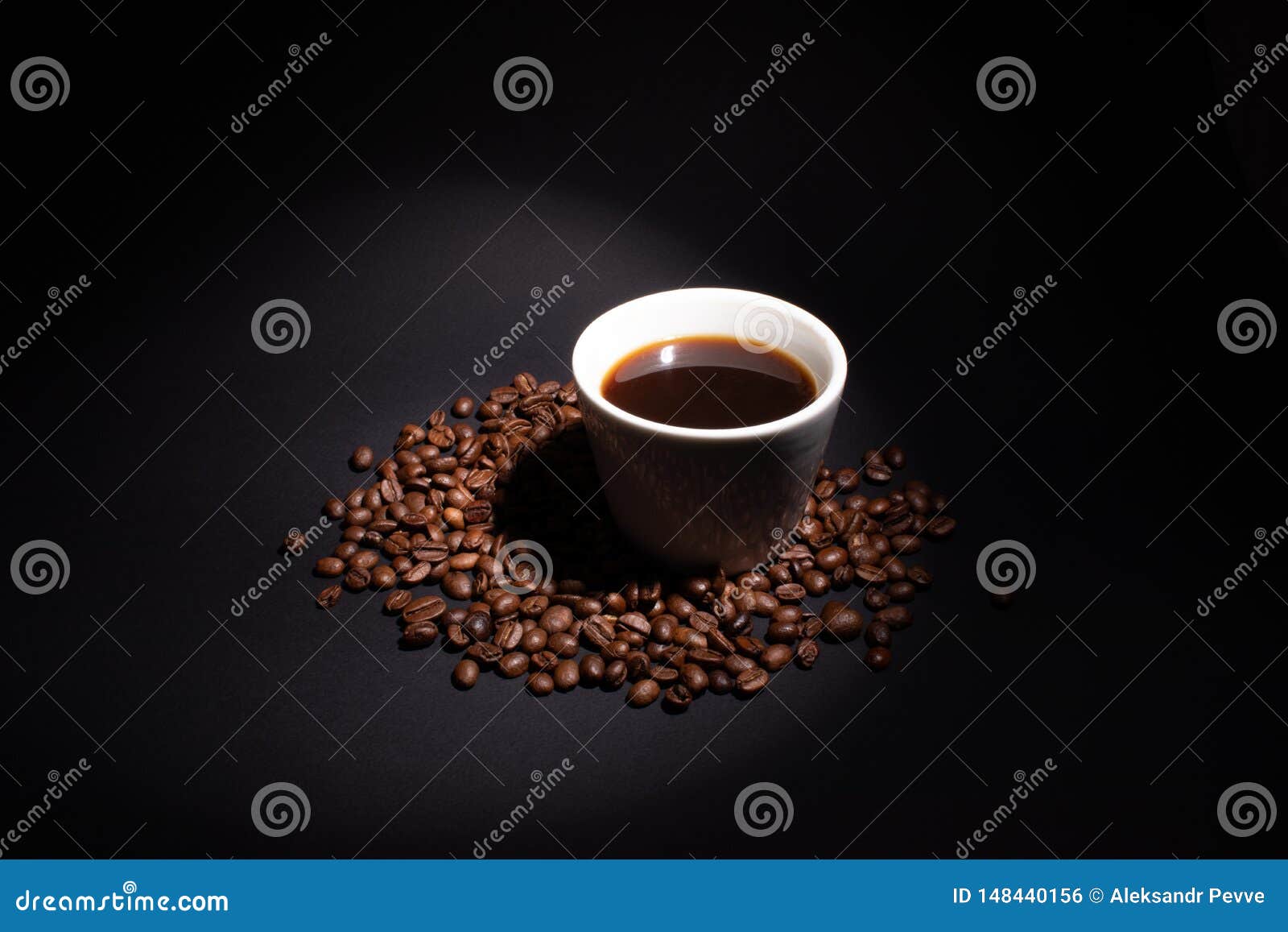 A Cup of Coffee is Lit by a Beam on the Right Above Stock Photo - Image ...