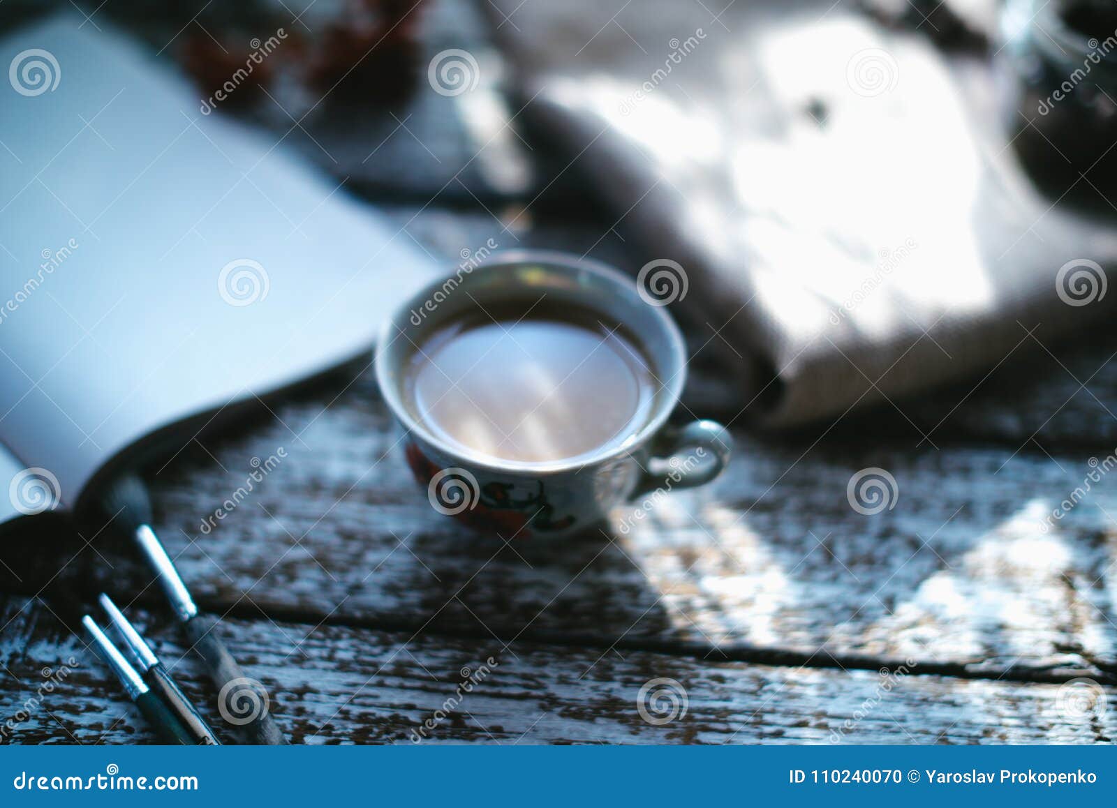 A Cup of Coffee in the Morning Sun. Stock Photo - Image of holder ...