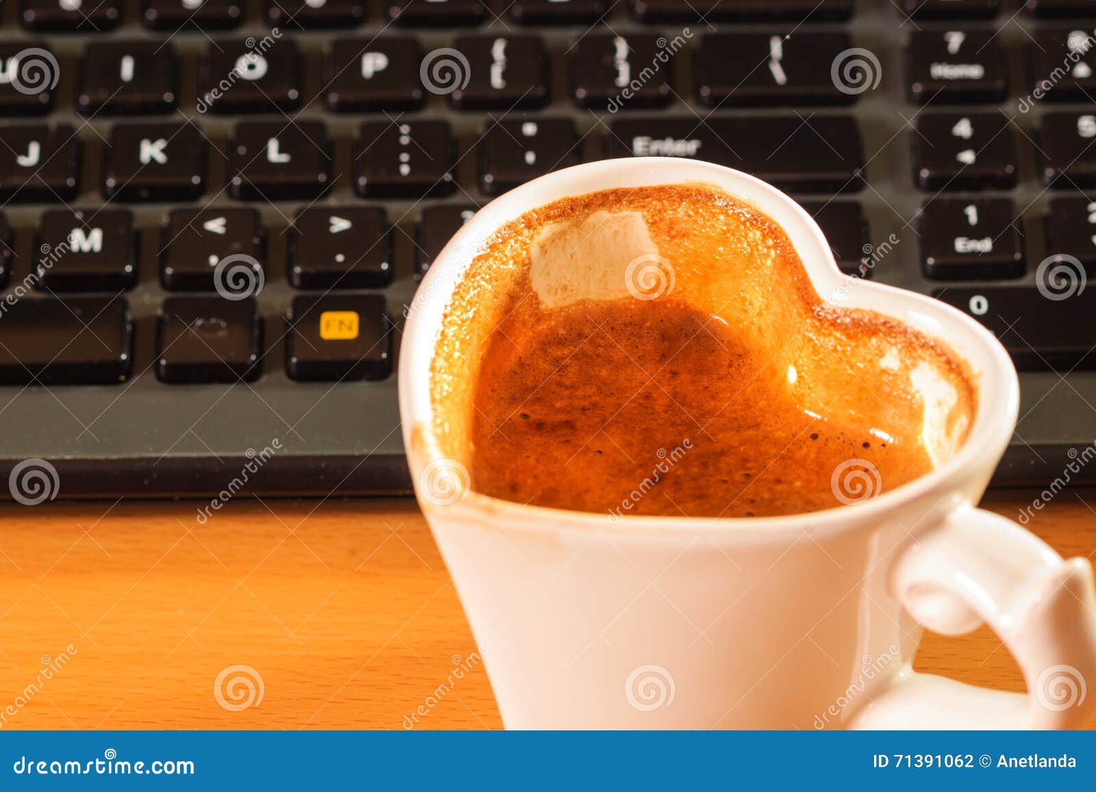 Cup of Coffee Next To Computer Keyboard. Stock Photo - Image of ...