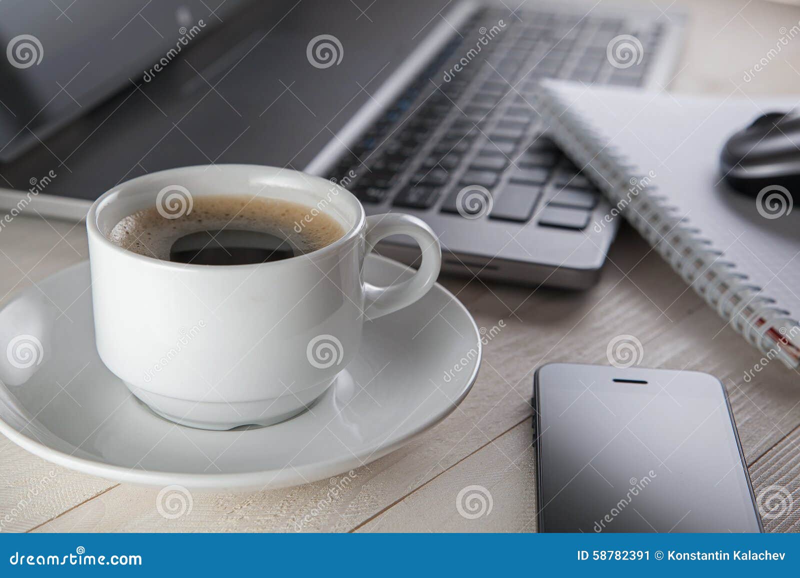 Cup of Coffee and Notebook, Laptop, Computer Mouse, Phone on a T Stock ...