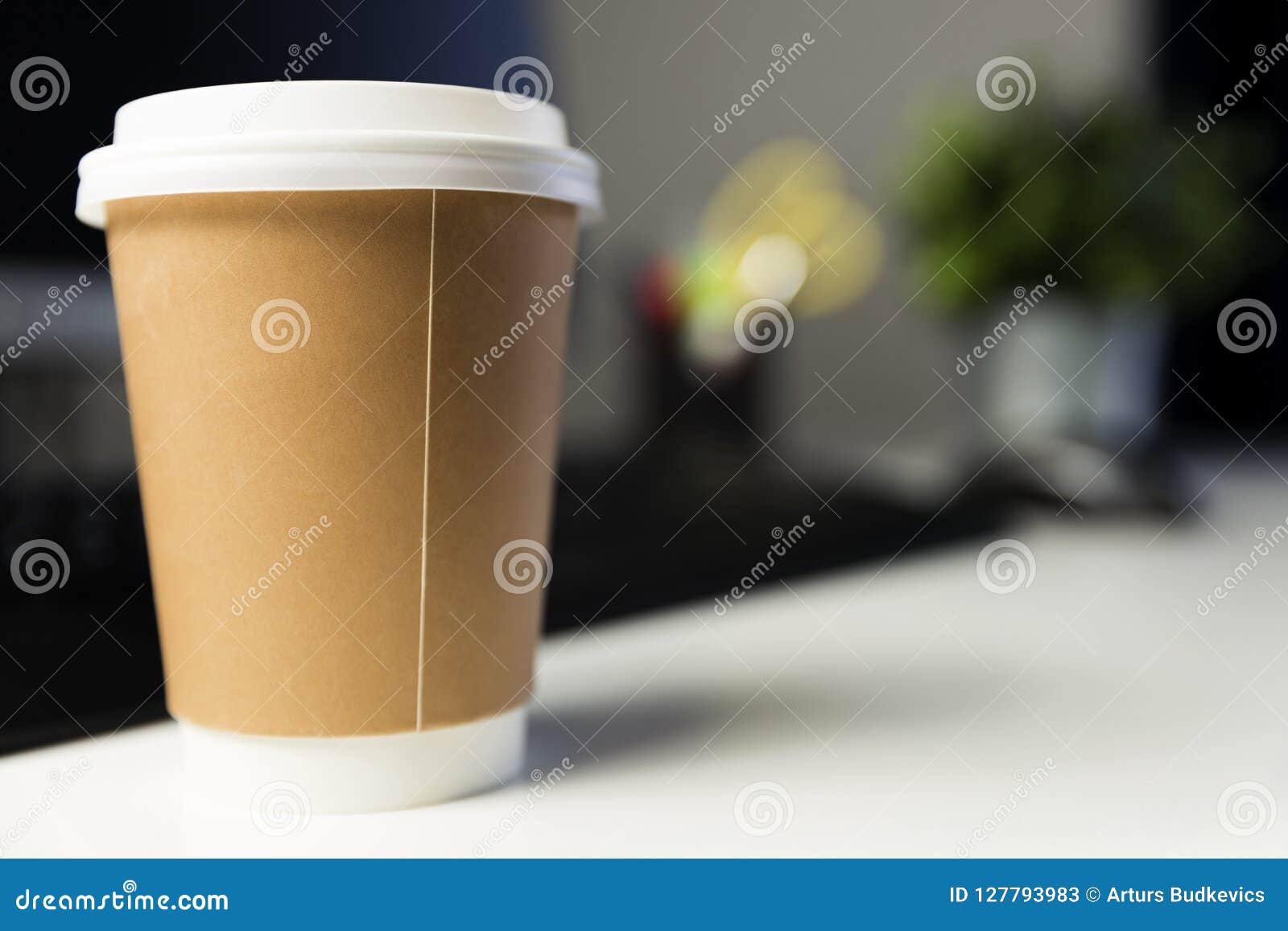 Cup of Coffee in Office Next To Computer. Working Late Concept Stock ...