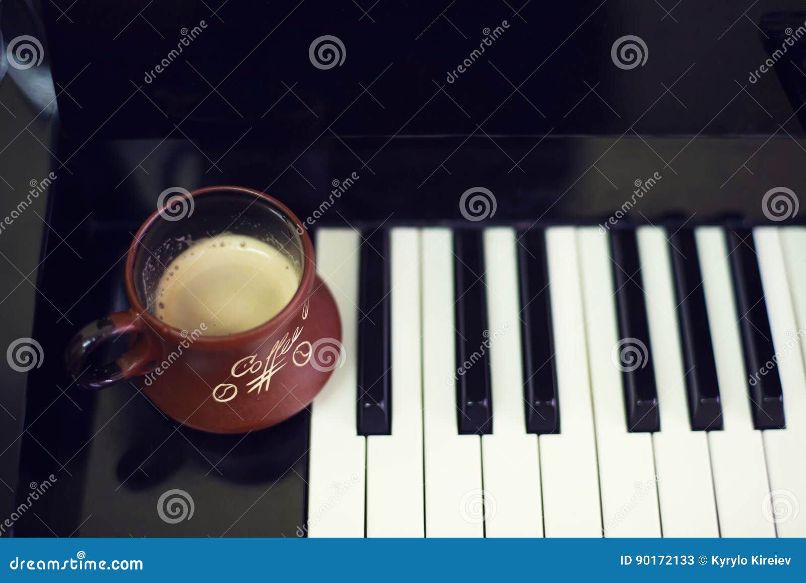 Cup of Coffee on an Old Piano Keyboard while Composing. Evening Time ...