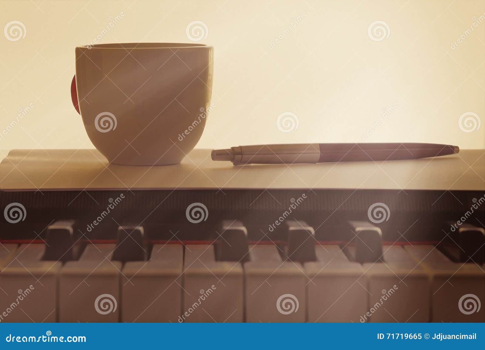 Cup of Coffee on an Old Piano Keyboard while Composing. Stock Image ...