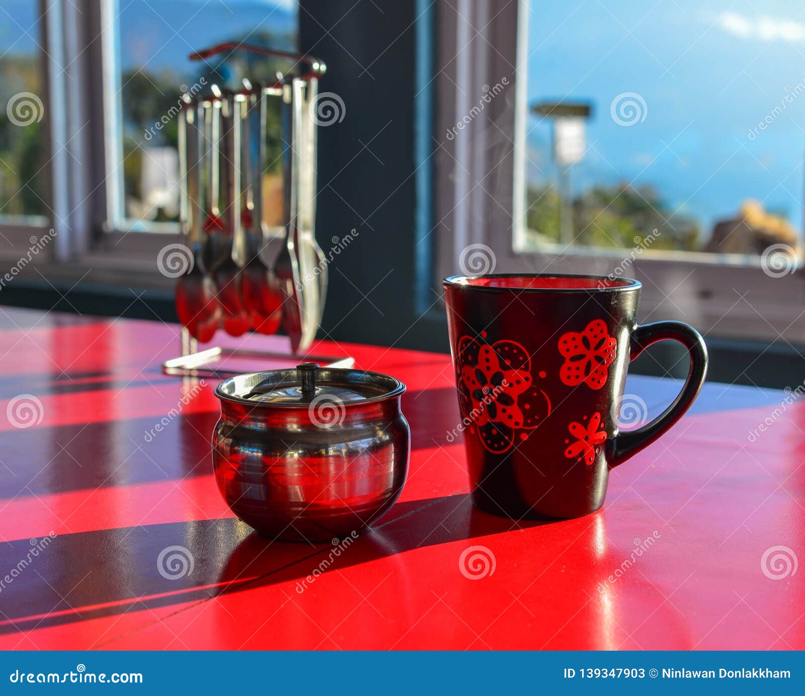 Cup of coffee on red table stock image. Image of nature - 139347903