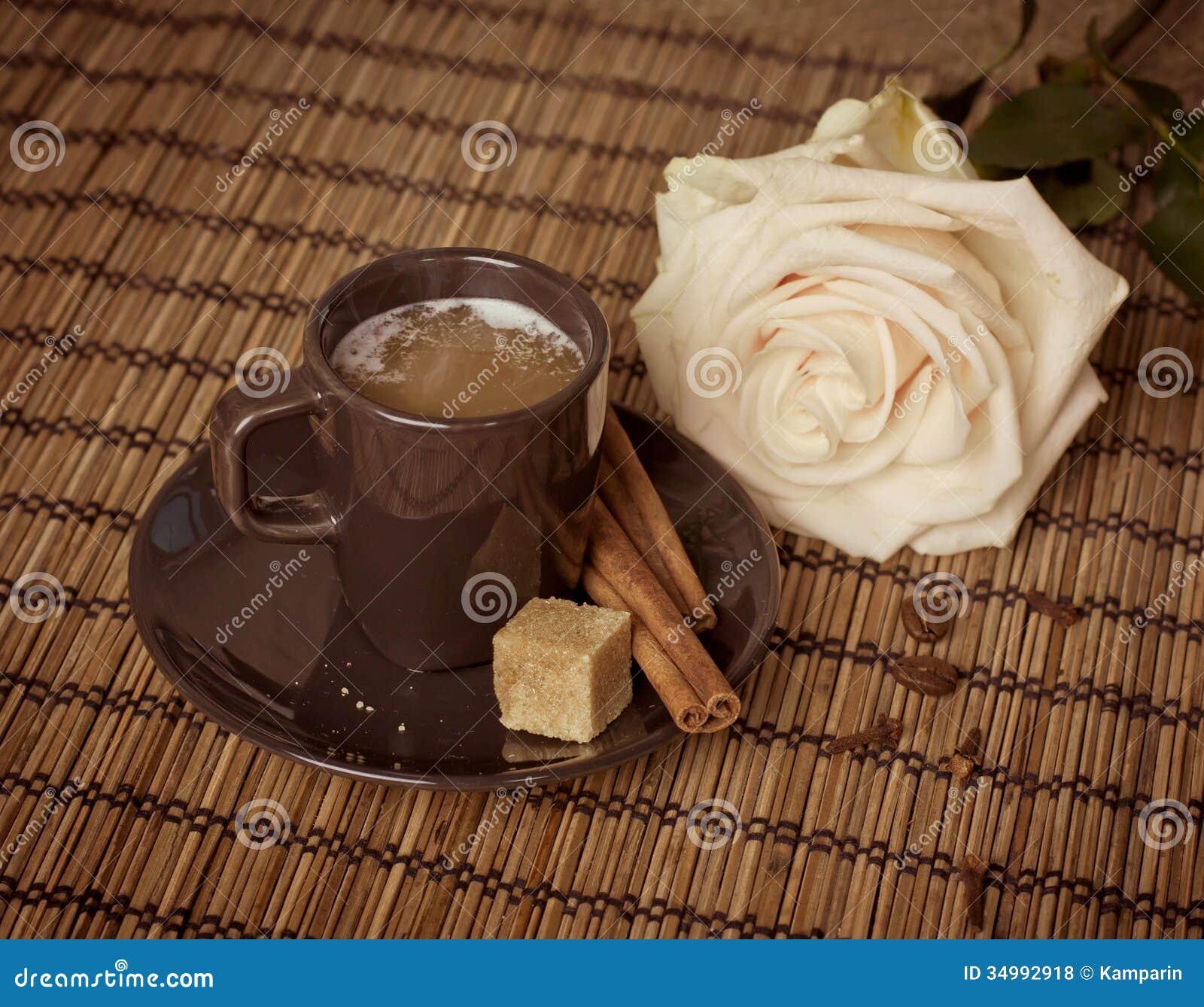 Cup of coffee with rose stock photo. Image of roasted - 34992918