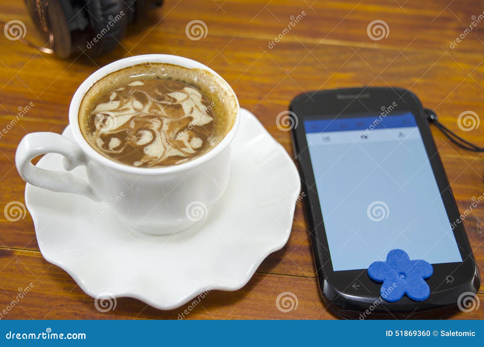 Cup of Coffee and a Smartphone on a Wooden Table Stock Photo - Image of ...