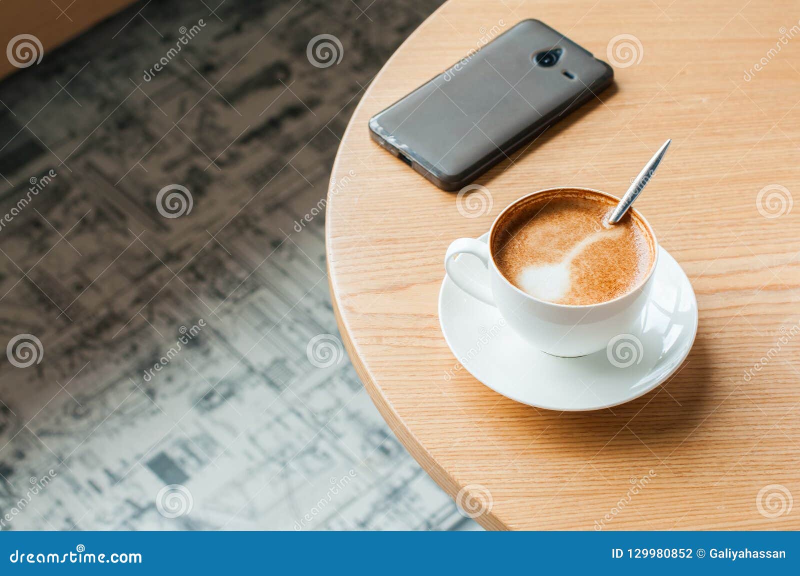 Cup of Coffee and Smartphone on a Working Table. Copy Space, Horizontal ...