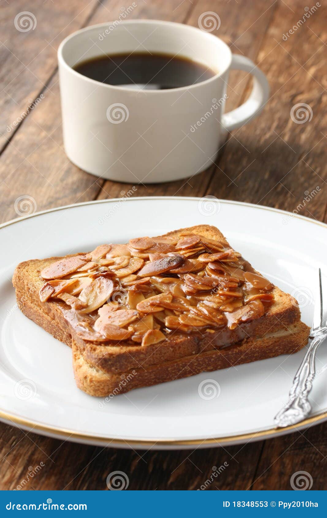 A Cup of Coffee and Toast with Almond Slices Stock Image - Image of ...