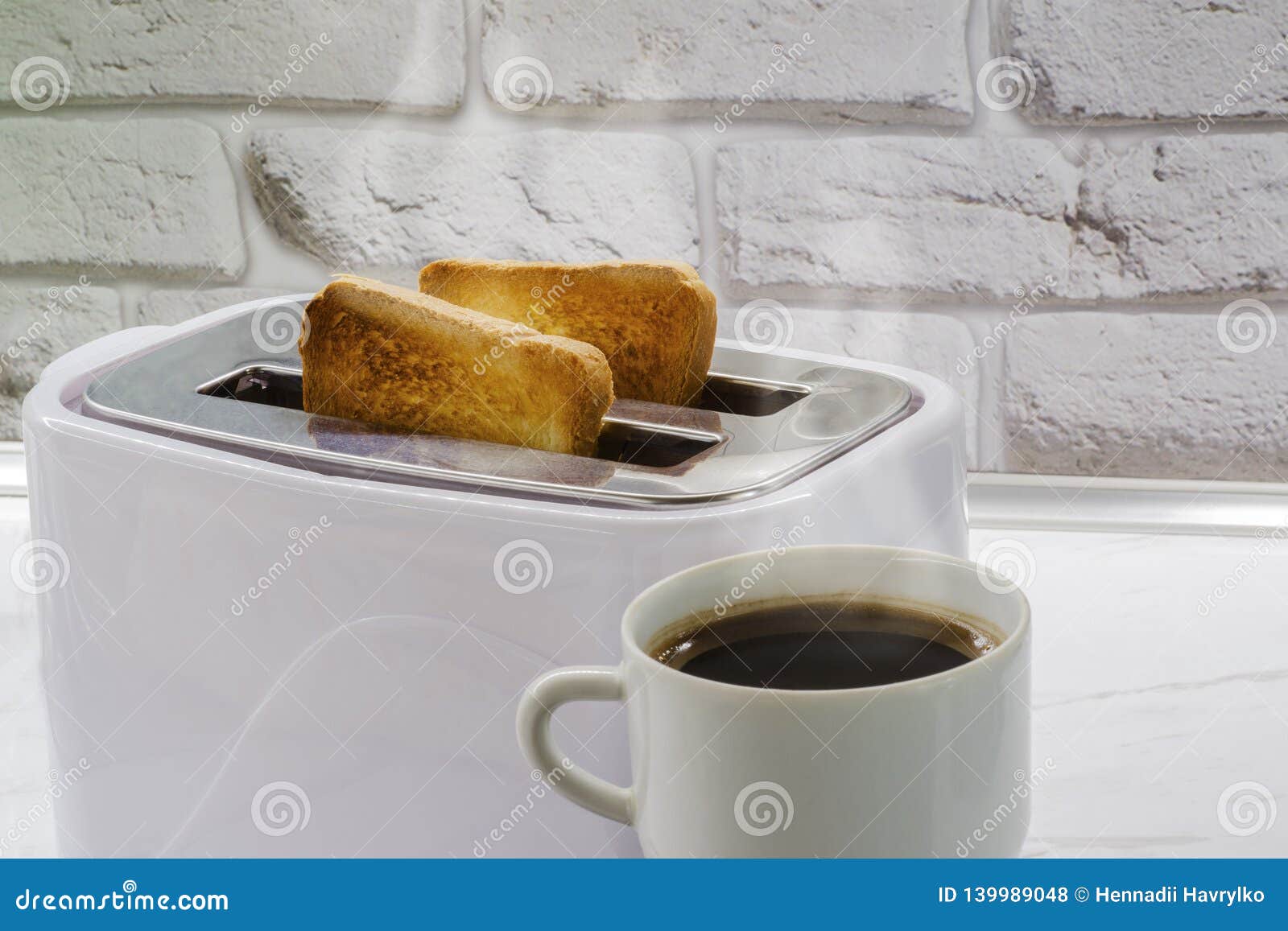 A Cup of Coffee and Toast in a Toaster Stock Photo - Image of snack ...