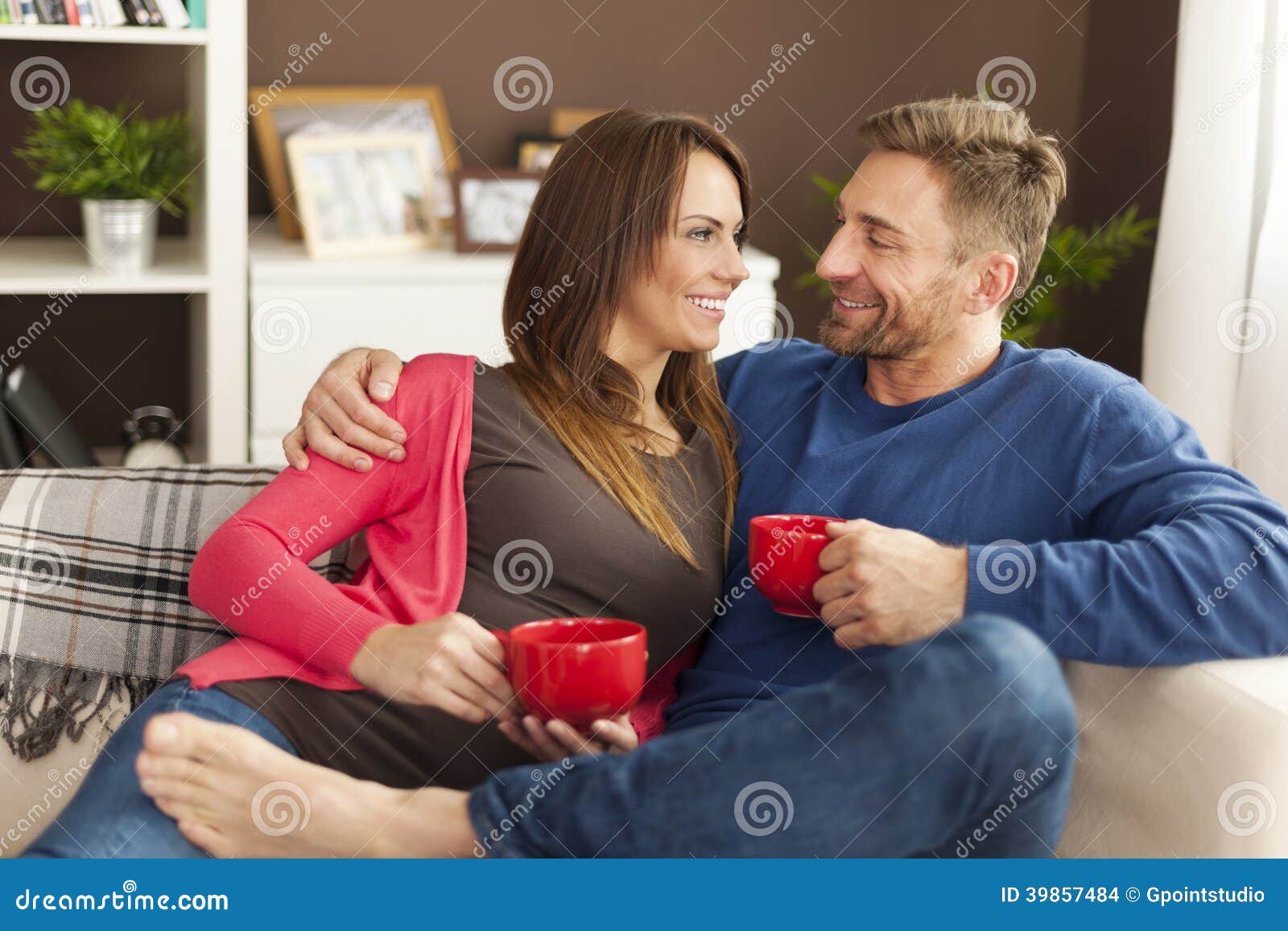 Cup of coffee together stock photo. Image of sofa, living - 39857484