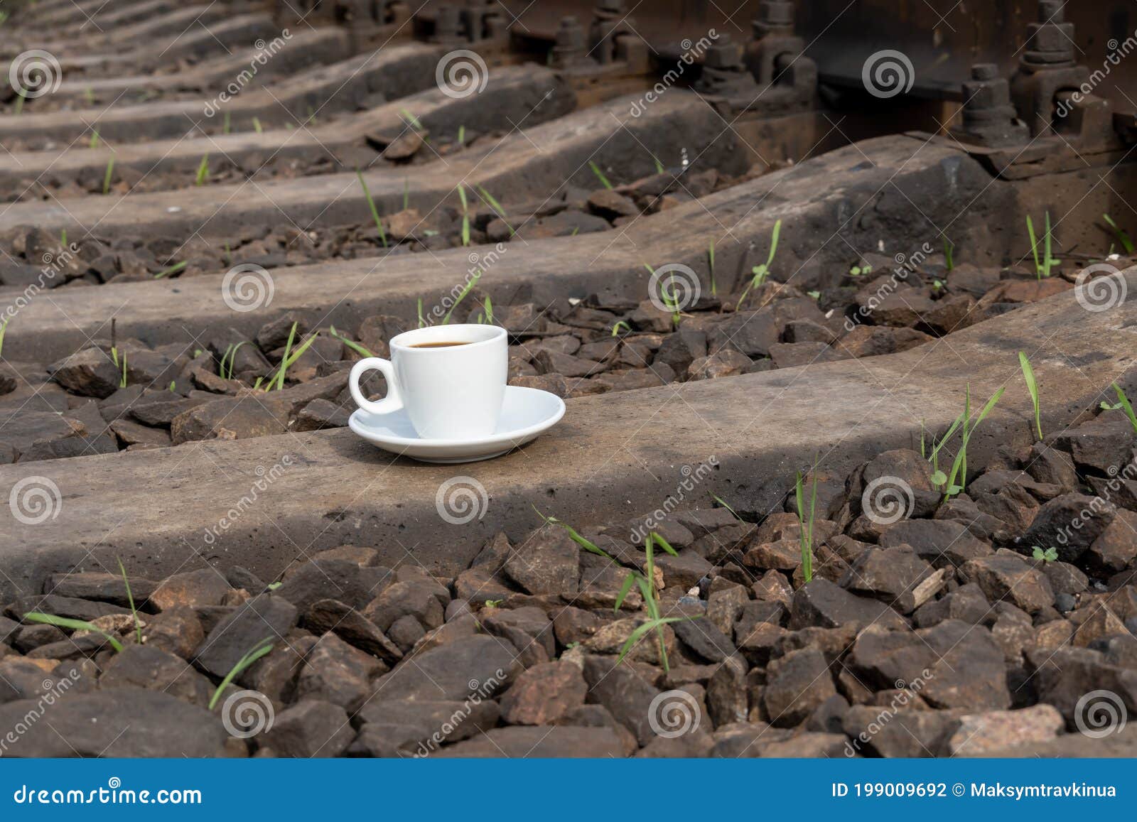 A Cup of Coffee on the Train Tracks Stock Photo - Image of blur, train ...