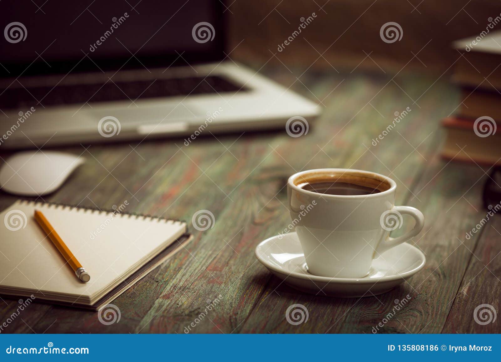 A Cup of Coffee in the Workplace on a Wooden Table Stock Photo - Image ...