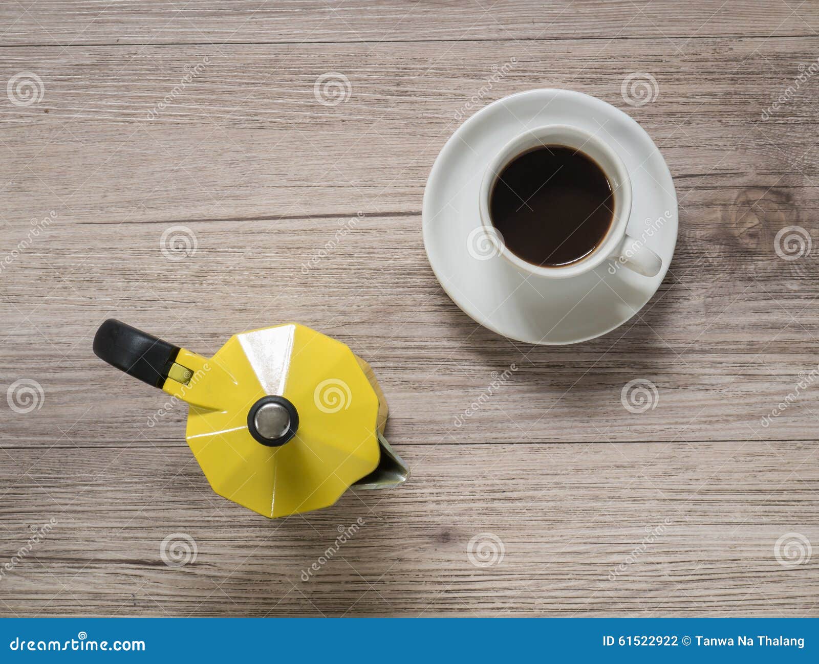 Cup of Coffee and Yellow Coffee Maker Kettle on Wooden Table Stock ...