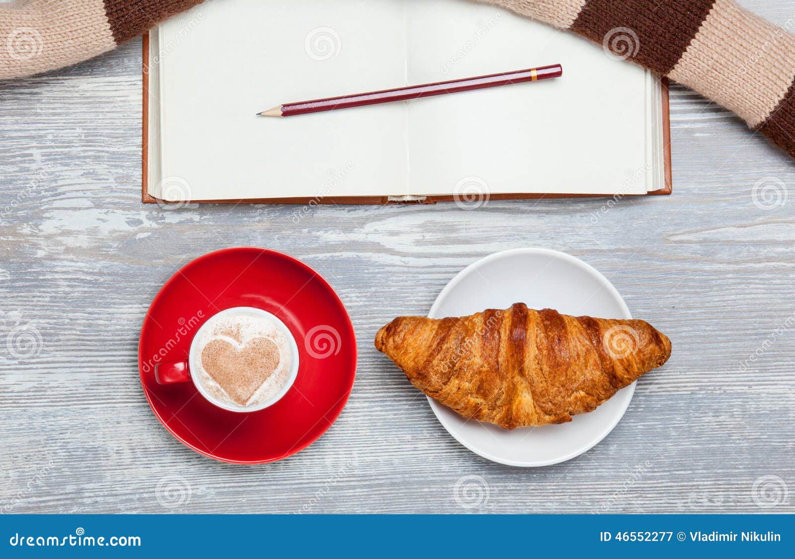 Cup, croissant and book stock image. Image of education - 46552277