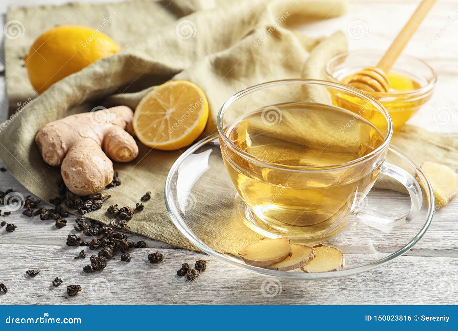 Cup of Delicious Tea with Lemon, Ginger and Honey on Table Stock Photo ...