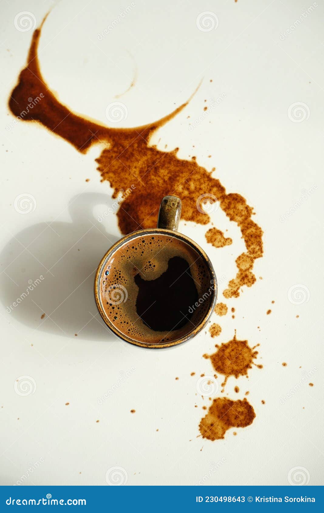 Cup of Espresso on Spilled Coffee Spots on White Background Top View ...