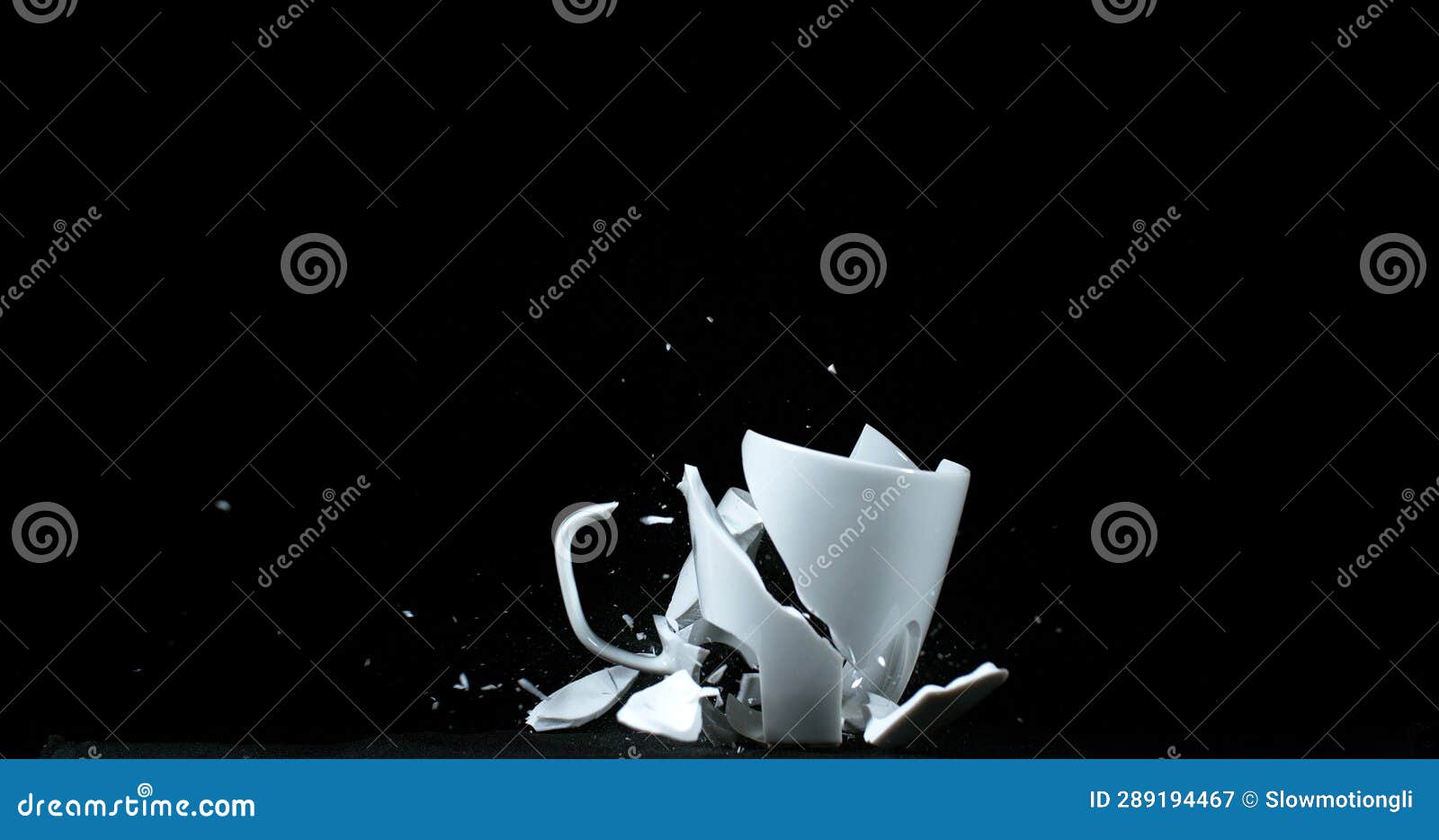 Cup Falling and Exploding on Black Background Stock Image - Image of ...