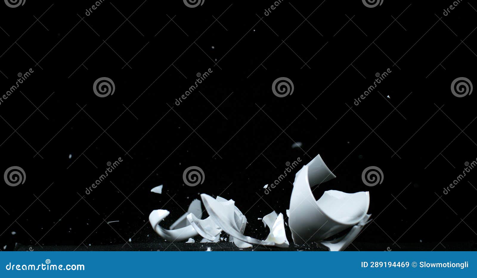 Cup Falling and Exploding on Black Background Stock Image - Image of ...