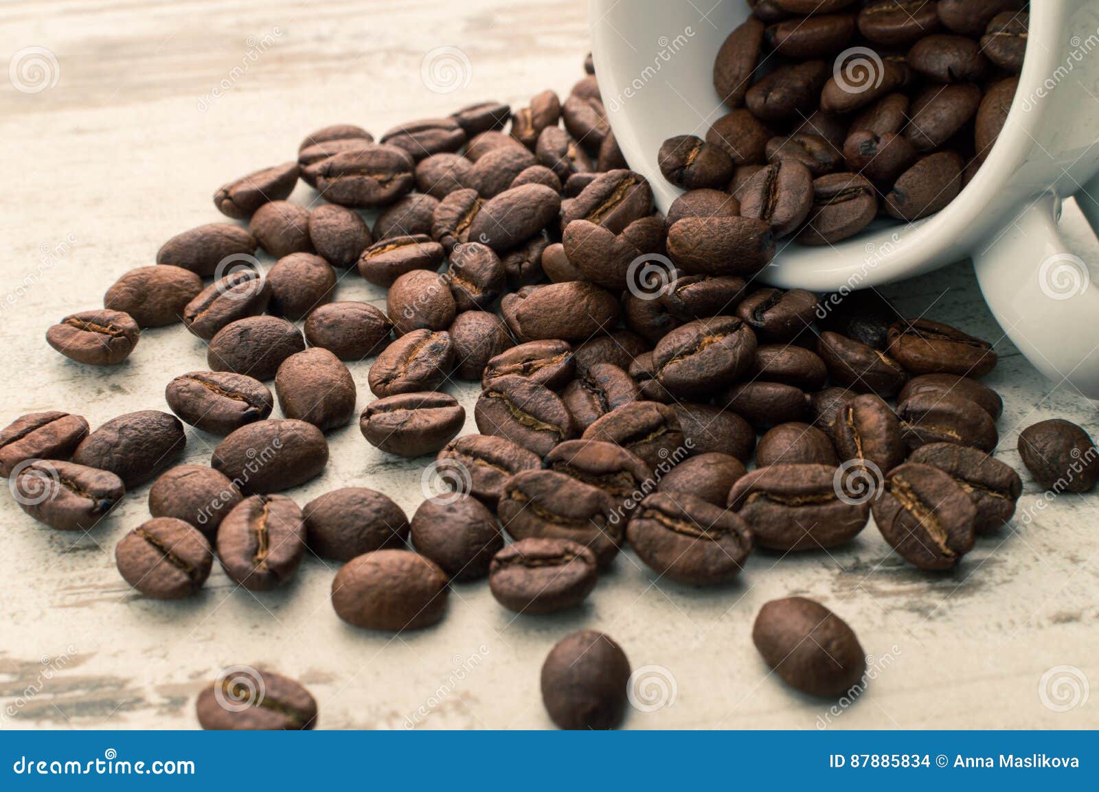 Cup Full of Coffee Beans on the Wooden Table Stock Photo - Image of ...