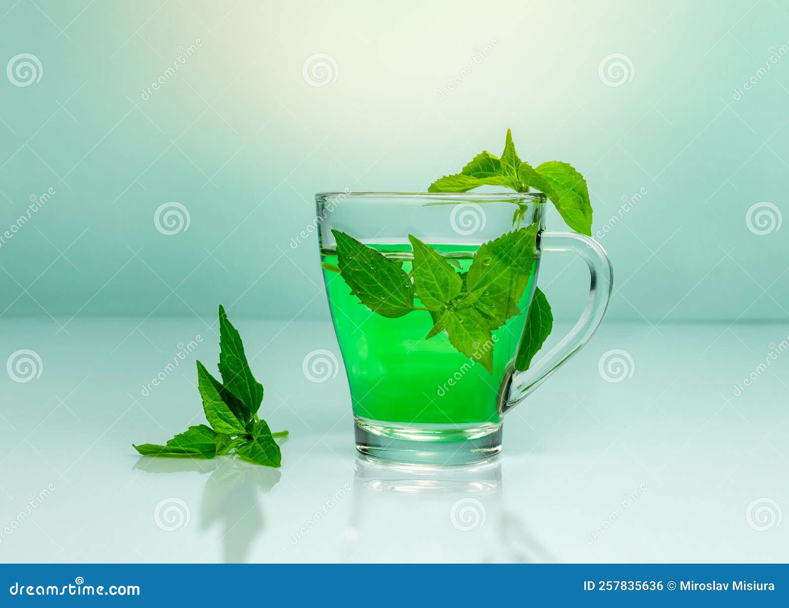 Cup with Green Tea and Green Leaves Stock Photo - Image of chinese ...